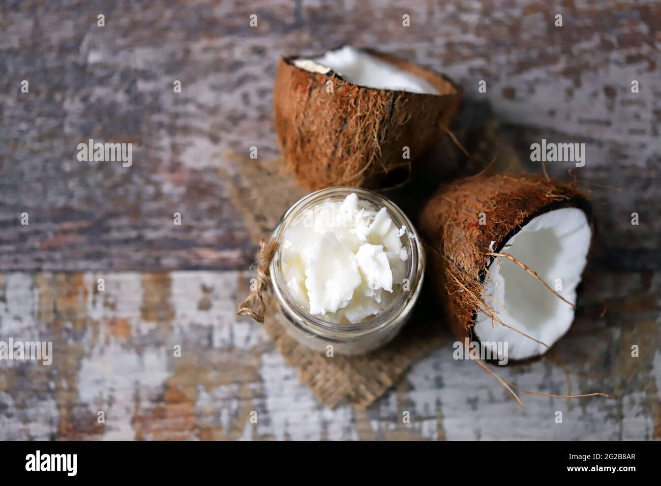 Coconut oil. Coconut in half. Healthy diet. Vegan diet Stock Photo - Alamy