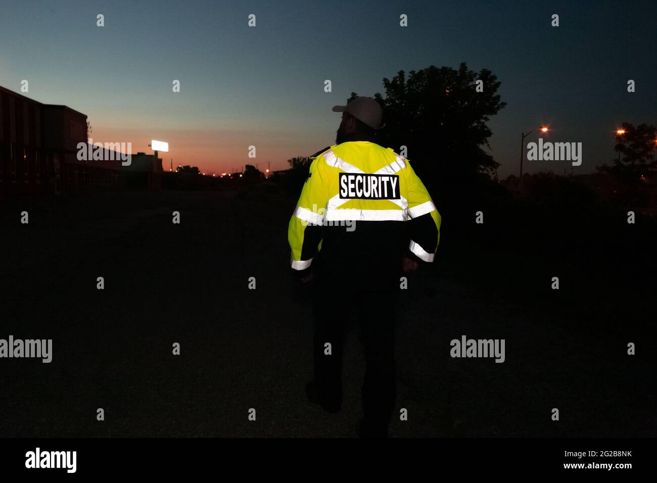 Security guard looking down street hi-res stock photography and images ...