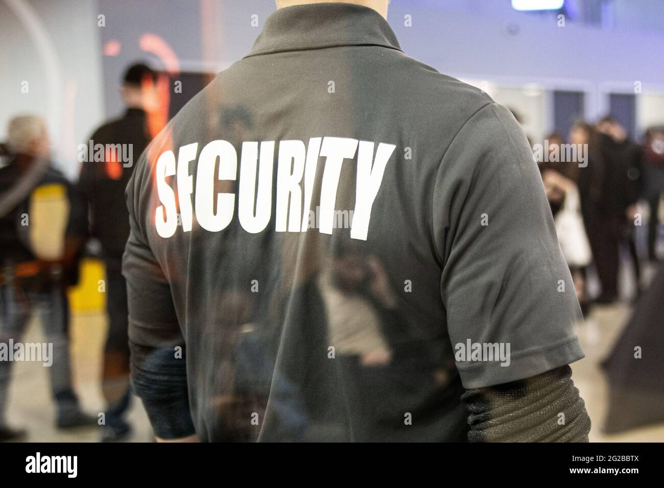 Closeup shot of guard inside a commercial building with reflecting ...
