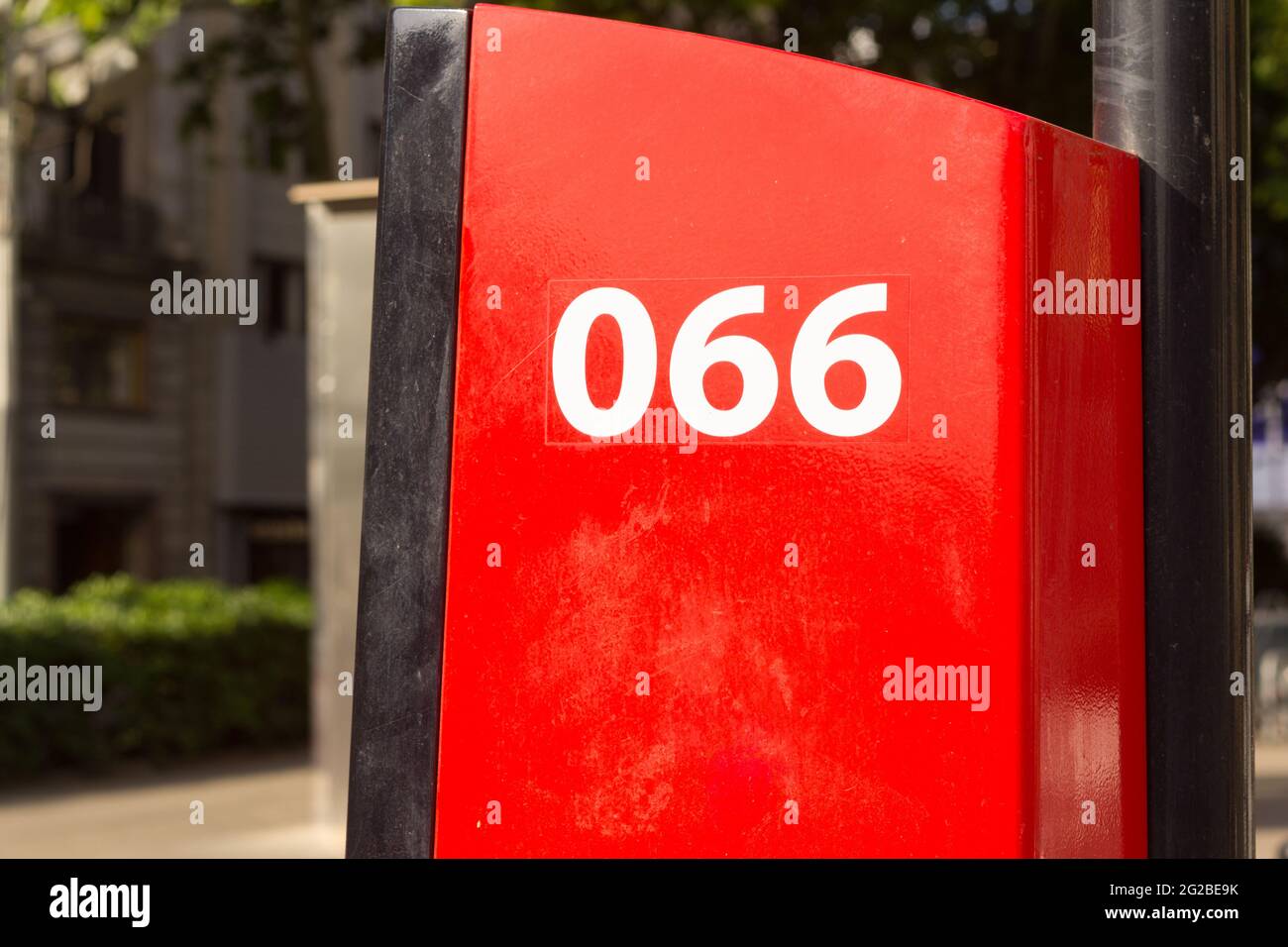 Number 066, white on red background; information Stock Photo - Alamy