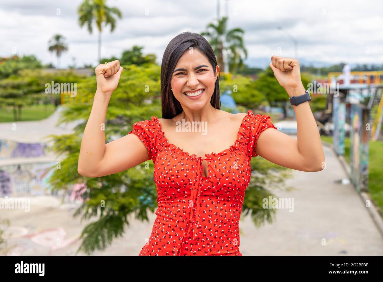 Pretty latina woman smiling hi-res stock photography and images - Alamy