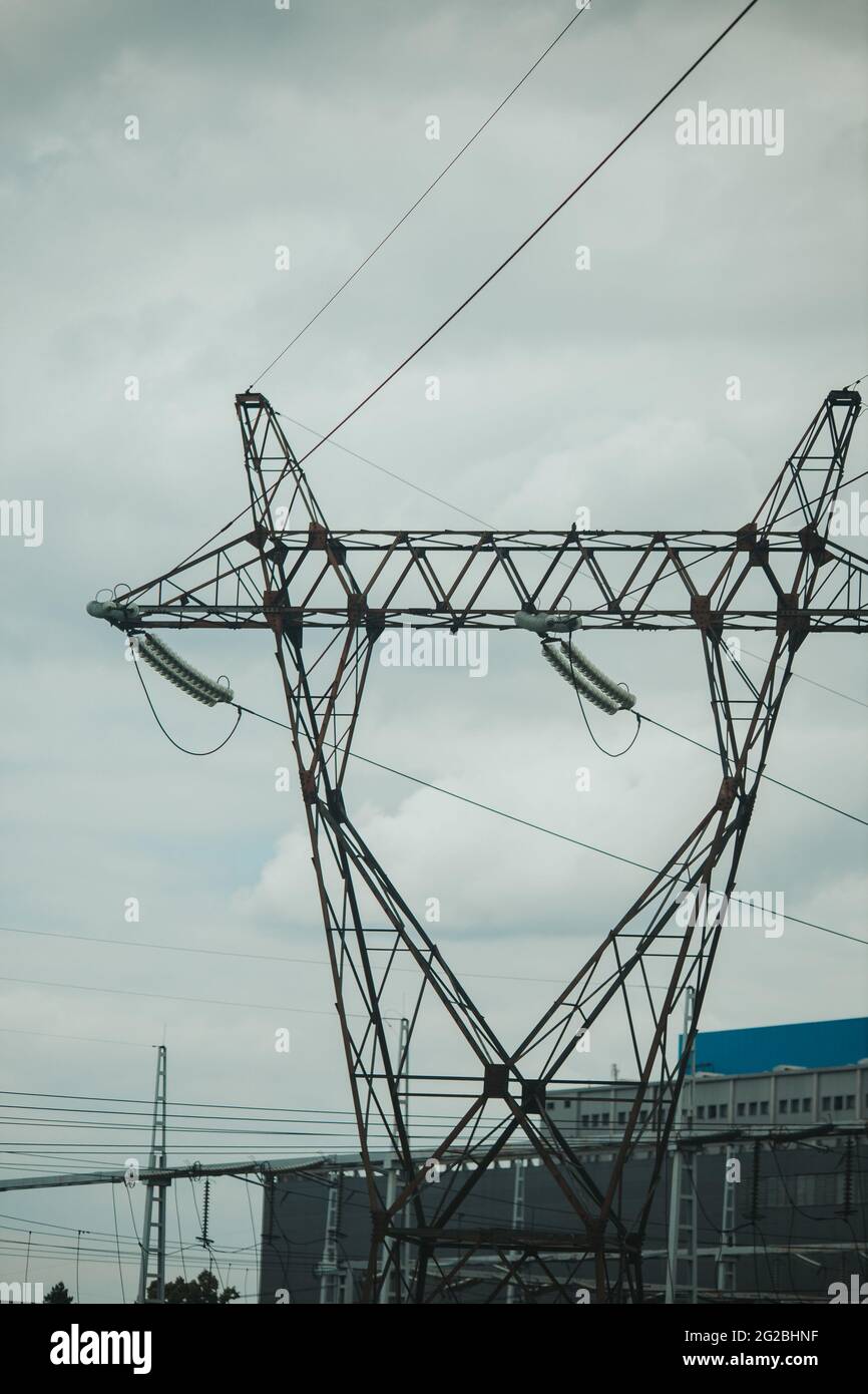 Vertical shot of a power transmission line Stock Photo - Alamy