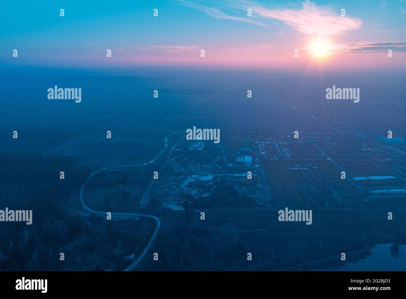 Rural landscape in the morning with the blue-pink sky. Aerial view of ...