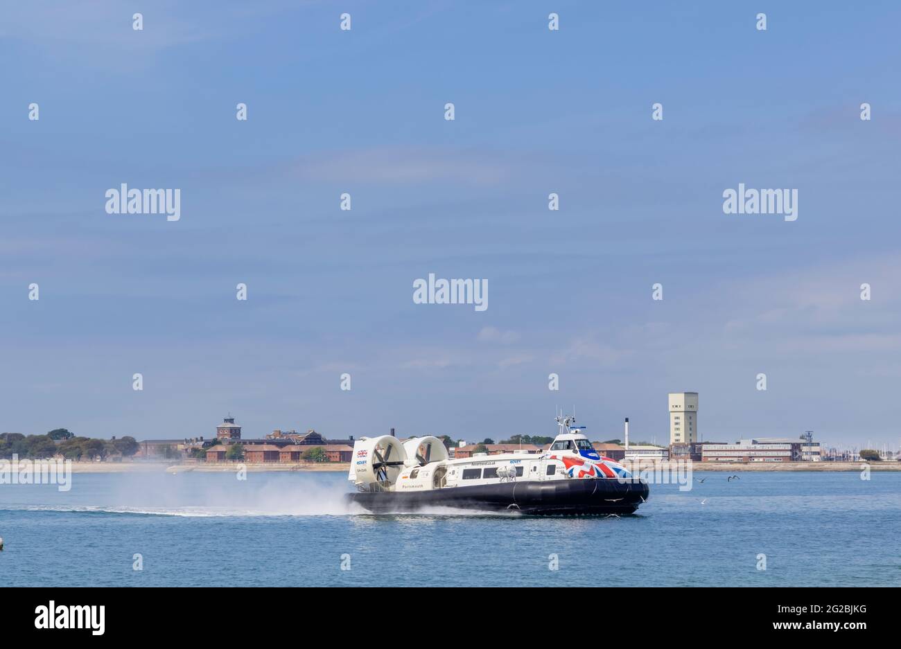 A Hovertravel hovercraft arrives from Ryde, Isle of Wight in a cloud of ...