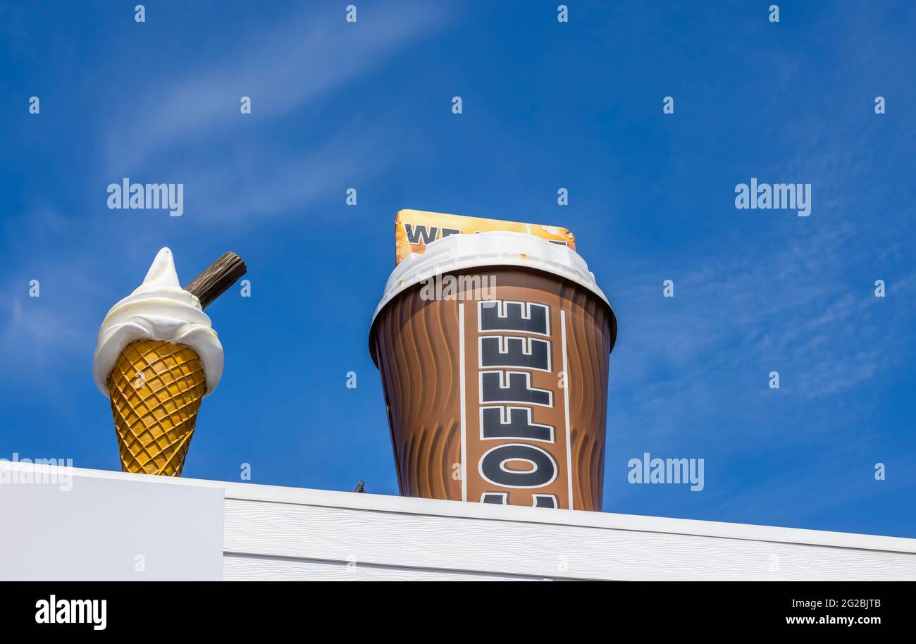 Ice-cream cone and coffee cup roof display on the front of gift shops ...