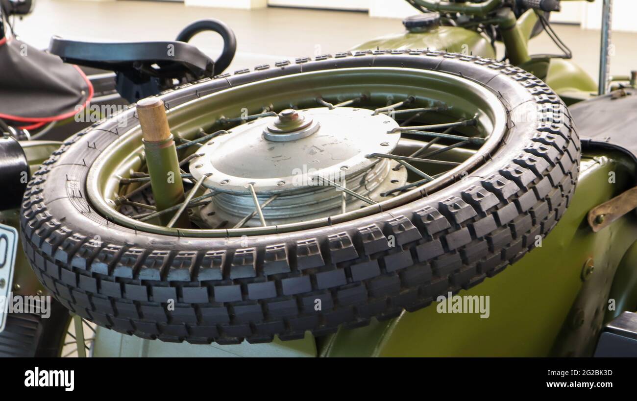 An old Soviet military motorcycle with a camouflage sidecar K-750, a ...