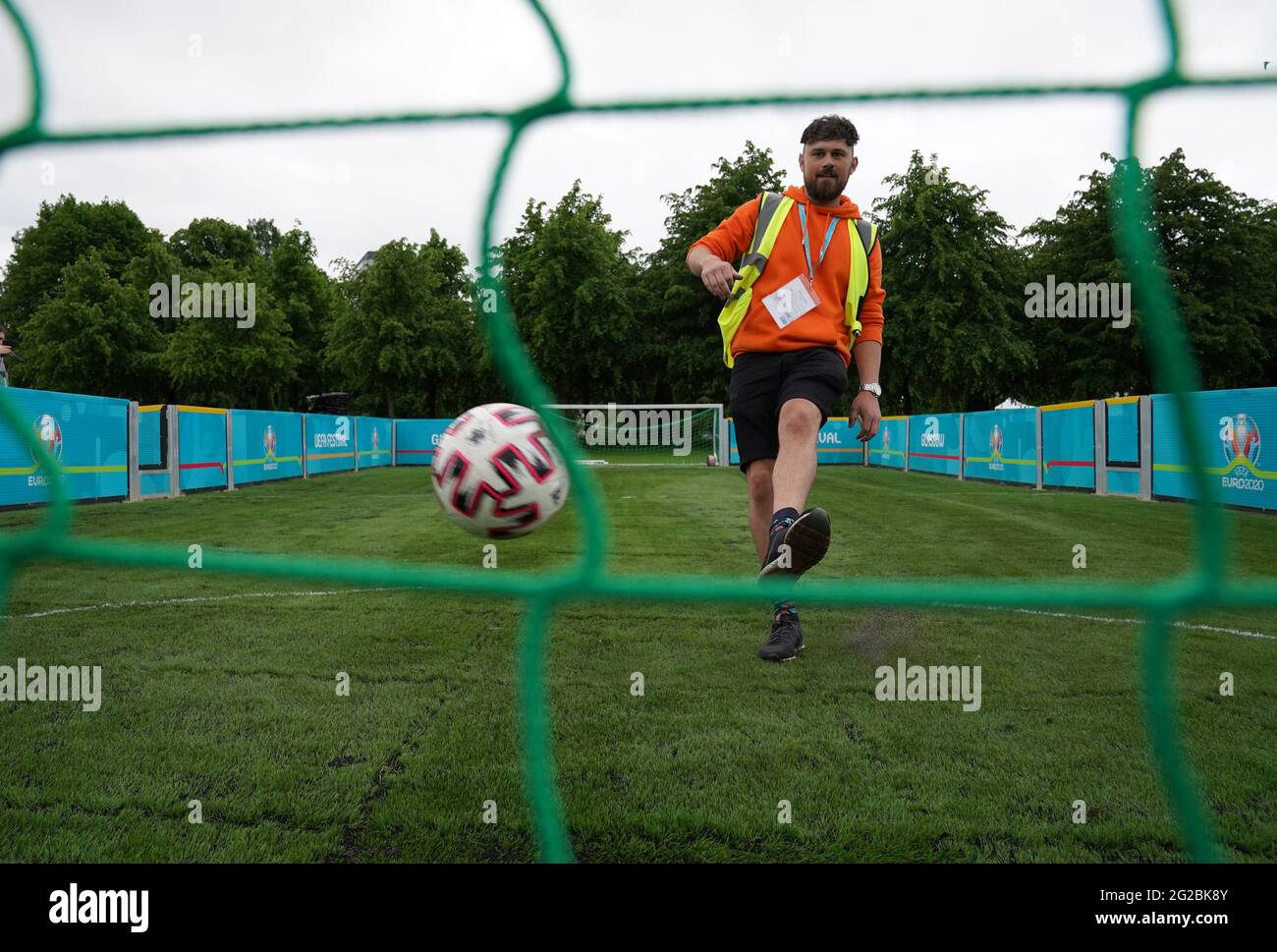 Workman Craig Malloy shows off his football skills at a five-a-side ...
