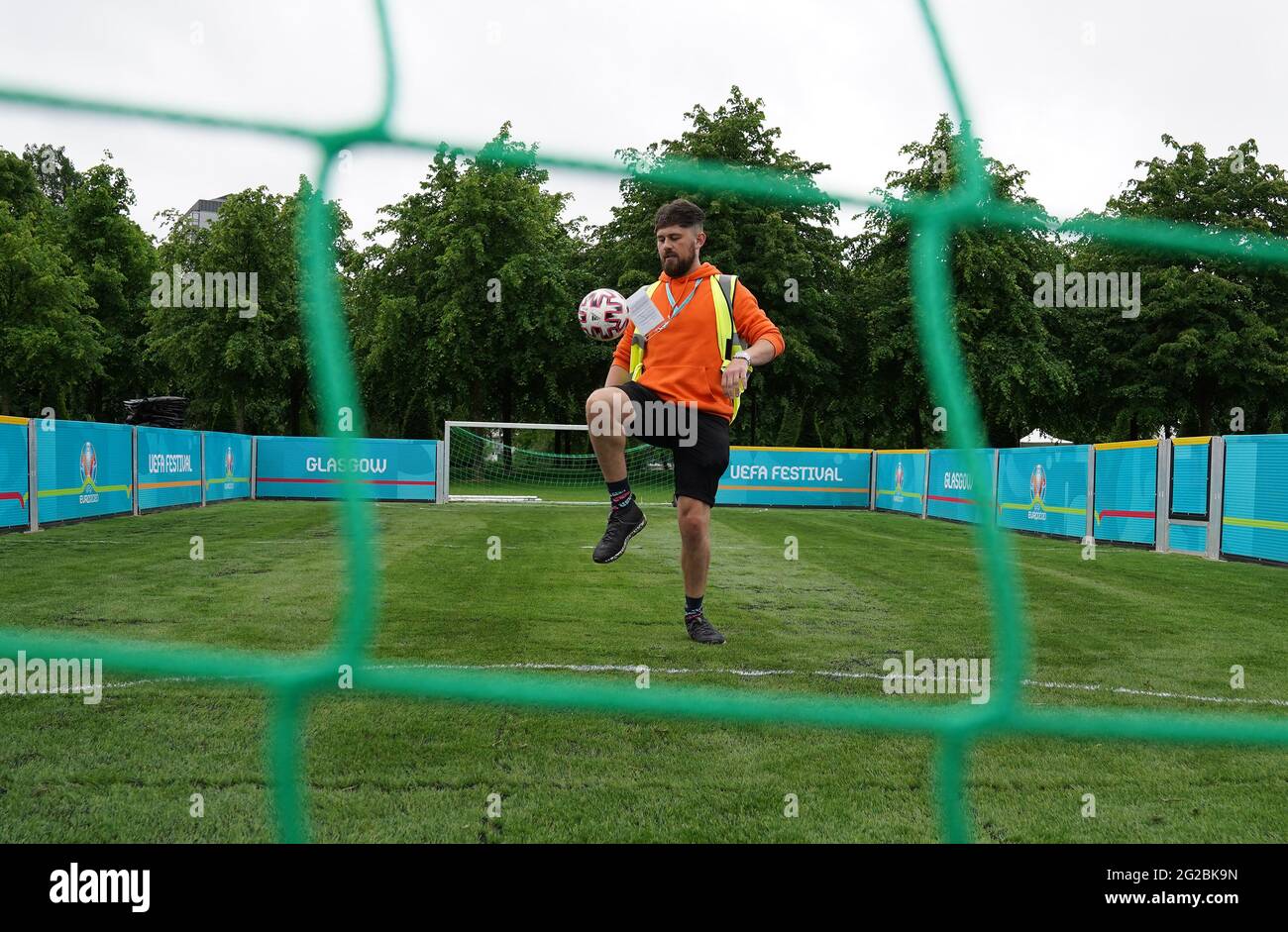 Workman Craig Malloy shows off his football skills at a five-a-side ...