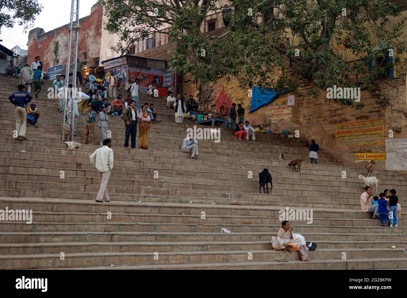 Steep steps at a Ghat in Varanasi, India lead down to the River Ganges ...