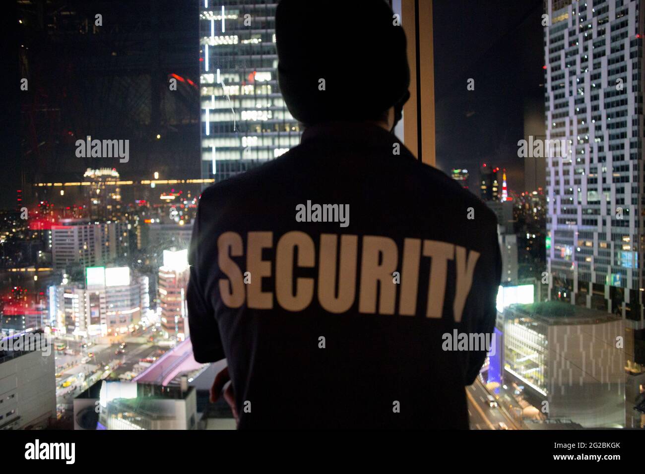 Security guard looking down street hi-res stock photography and images ...