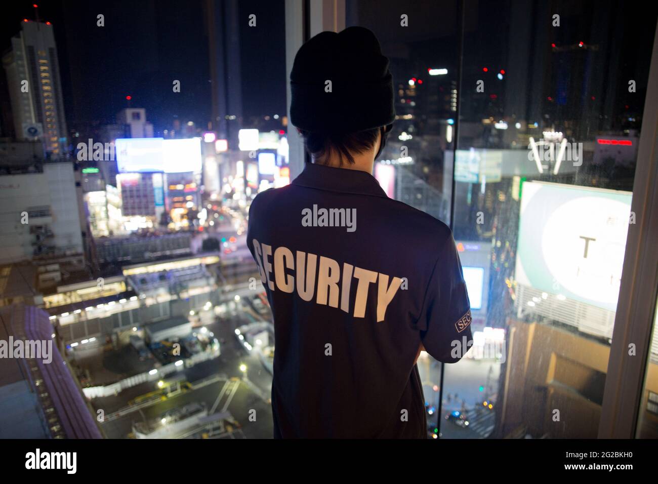 Security guard looking down street hi-res stock photography and images ...