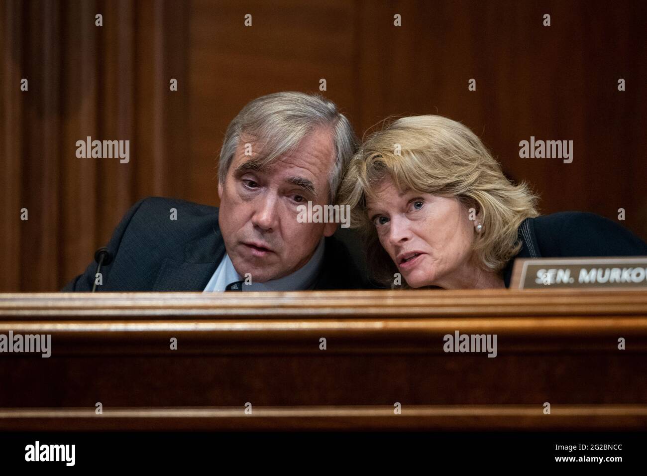 United States Senator Jeff Merkley (Democrat of Oregon), left, and ...