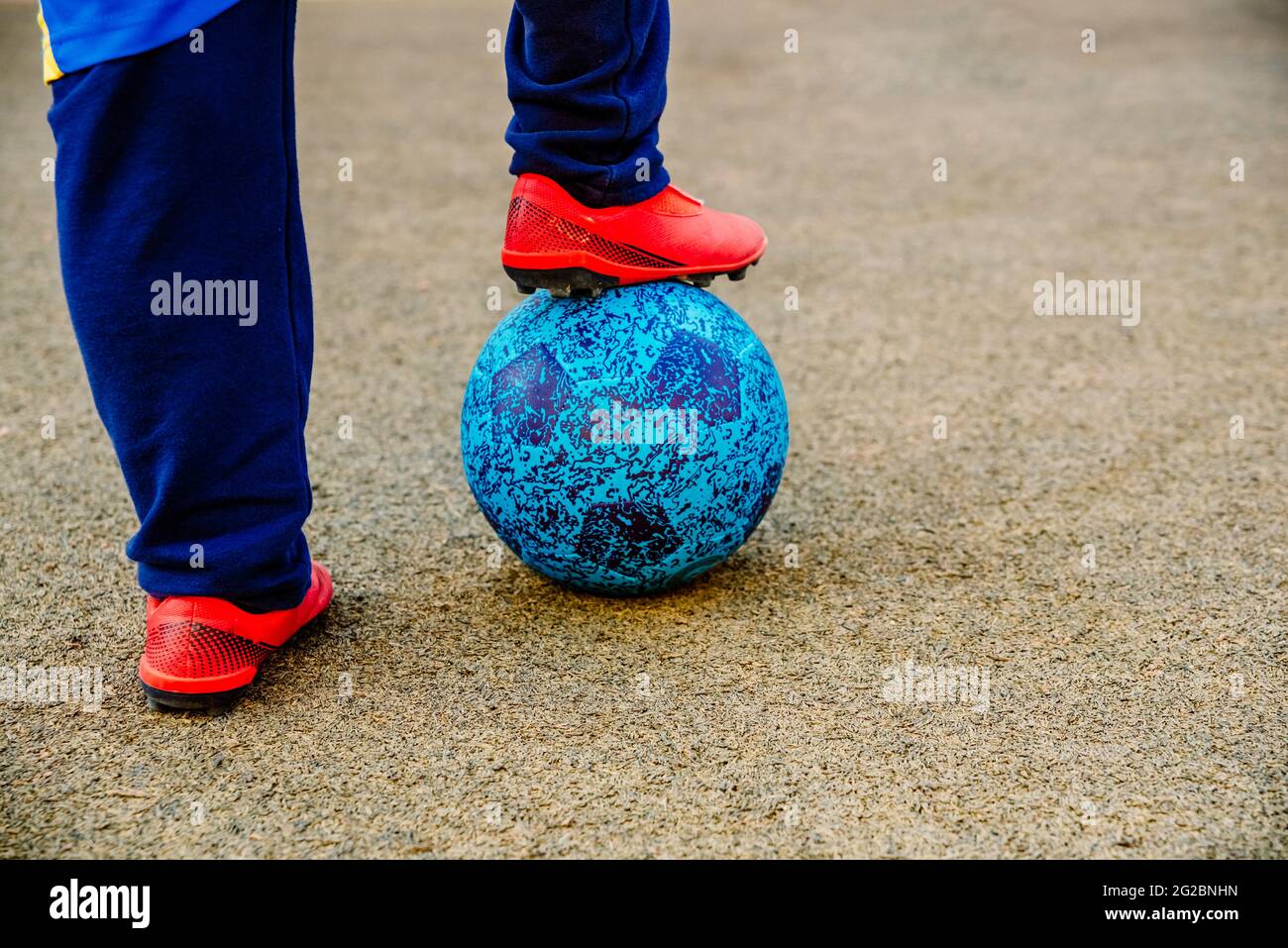 A boy with a soccer ball under his feet Stock Photo - Alamy