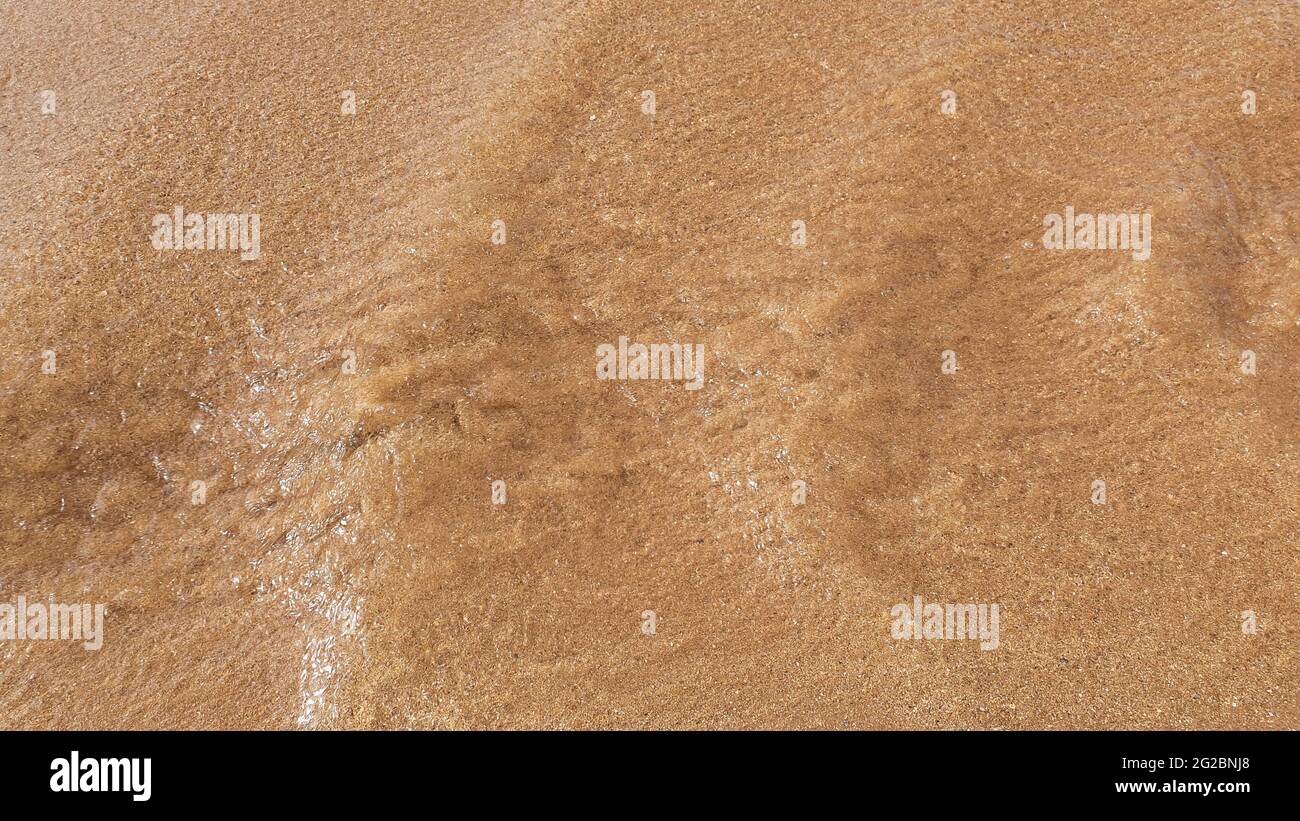 Patterns in sand, shaped by sea Stock Photo - Alamy