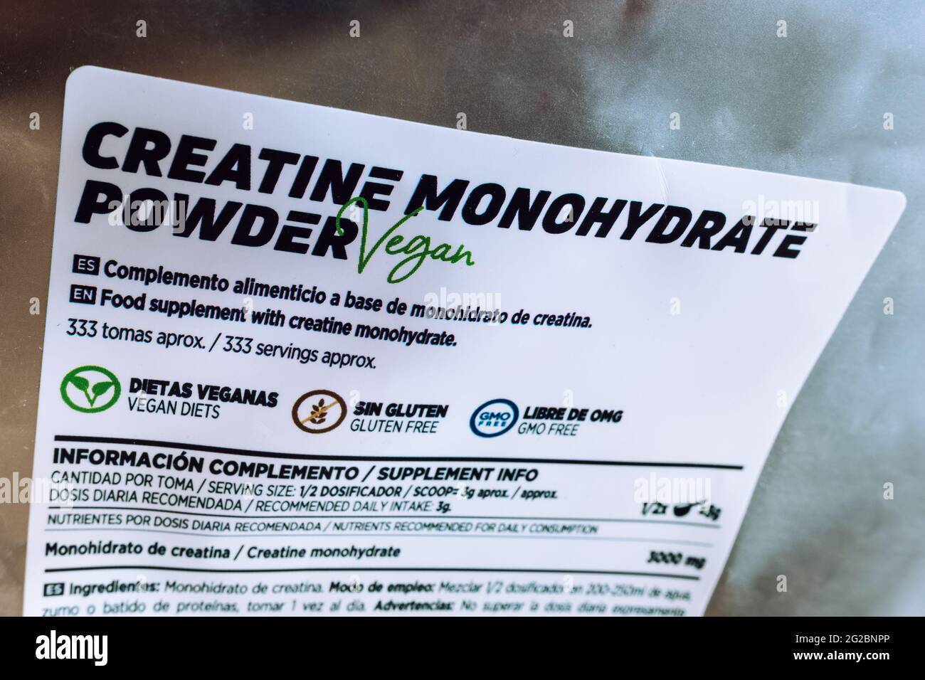 Valencia, Spain - June 6, 2021: Label of a package of Creatine powder ...