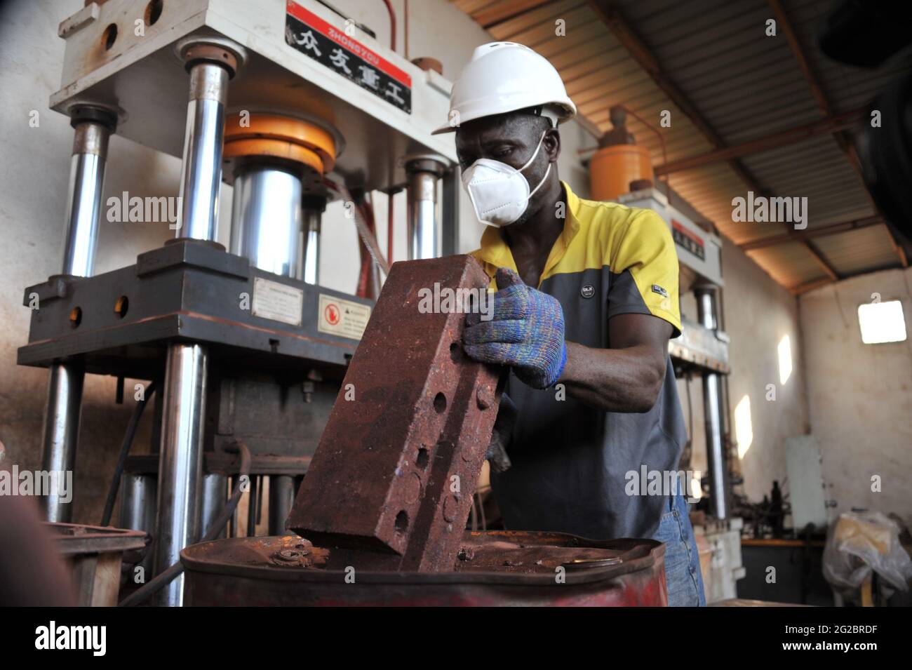 Accra, Ghana. 27th May, 2021. A worker is busy at the plastic recycling ...