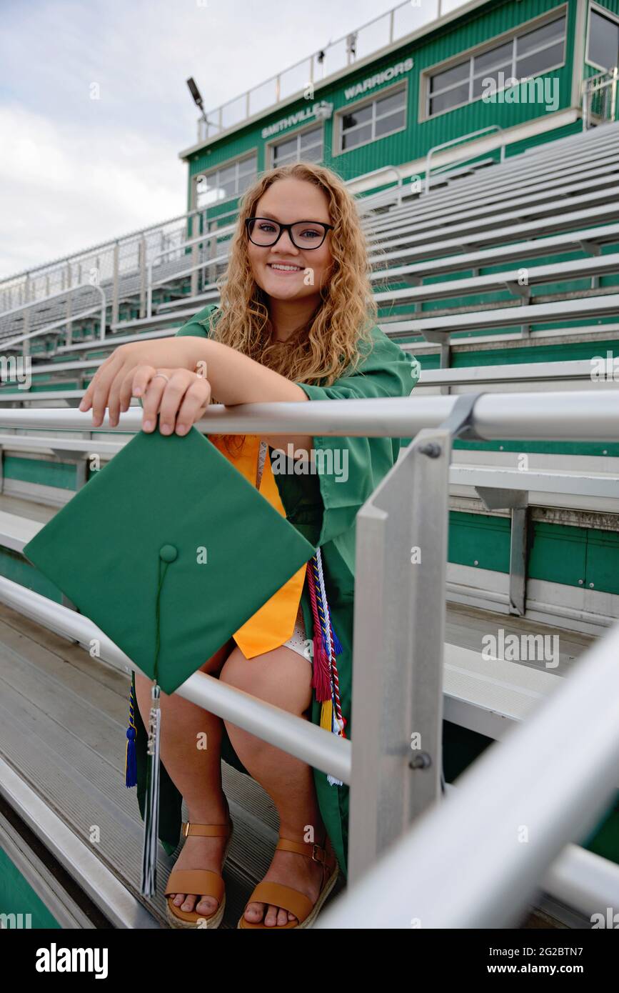 Beautiful young high school graduate with blonde hair Stock Photo - Alamy
