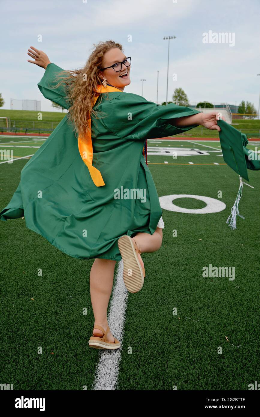 Beautiful young high school graduate with blonde hair Stock Photo - Alamy