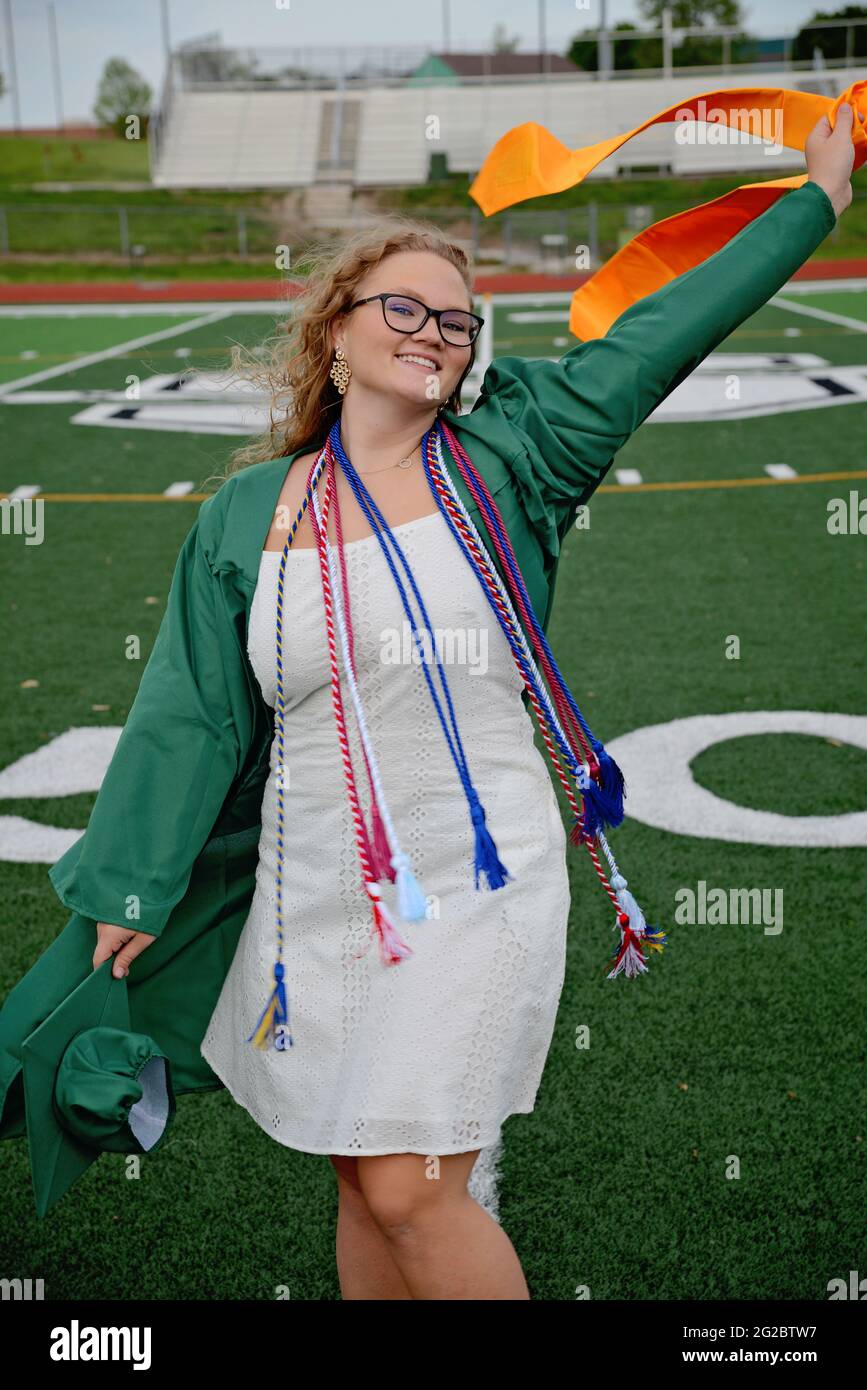 Beautiful young high school graduate with blonde hair Stock Photo - Alamy