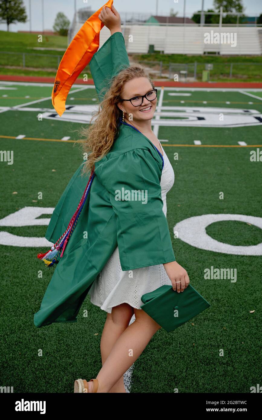 Beautiful young high school graduate with blonde hair Stock Photo - Alamy