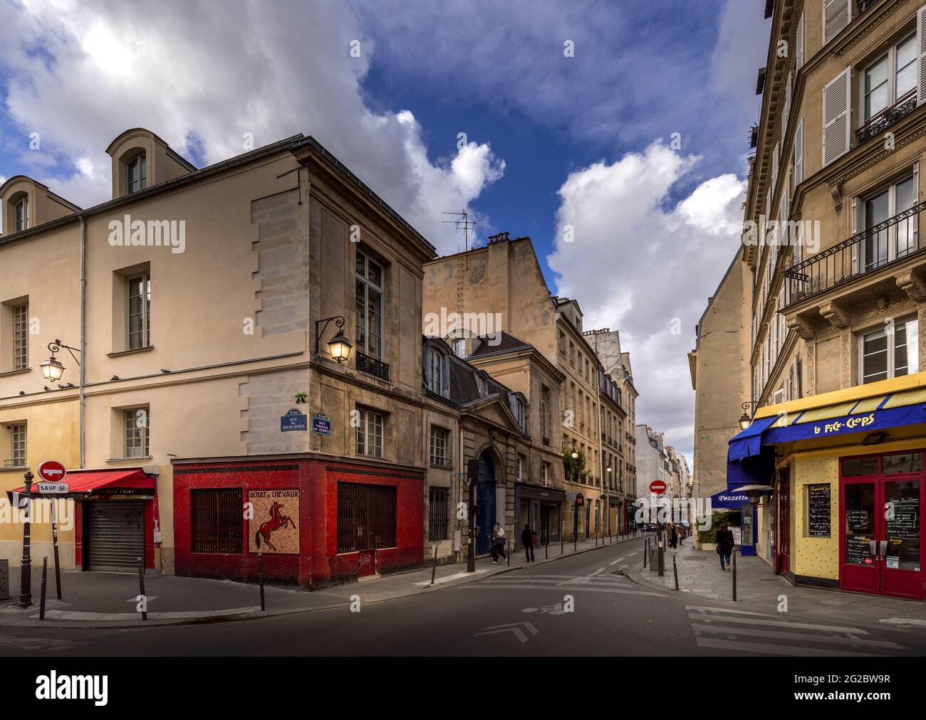 Paris, France - May 4, 2021: Typical buildings and shops in Marais ...