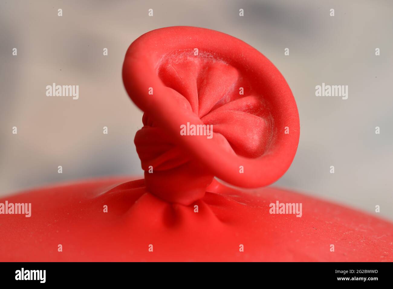 Closeup shot of a red balloon knot for wallpaper and background Stock ...