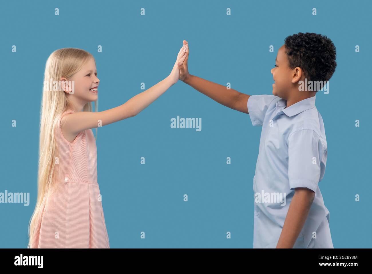 African and caucasian hand touching hi-res stock photography and images ...
