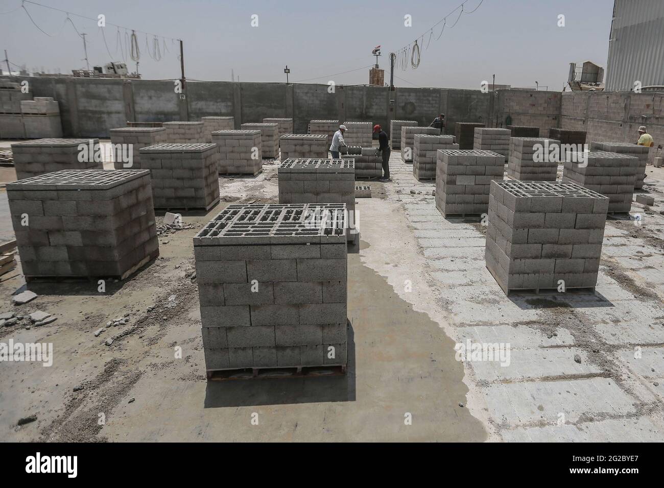 Gaza City, Palestinian Territories. 10th June, 2021. Workers line up ...