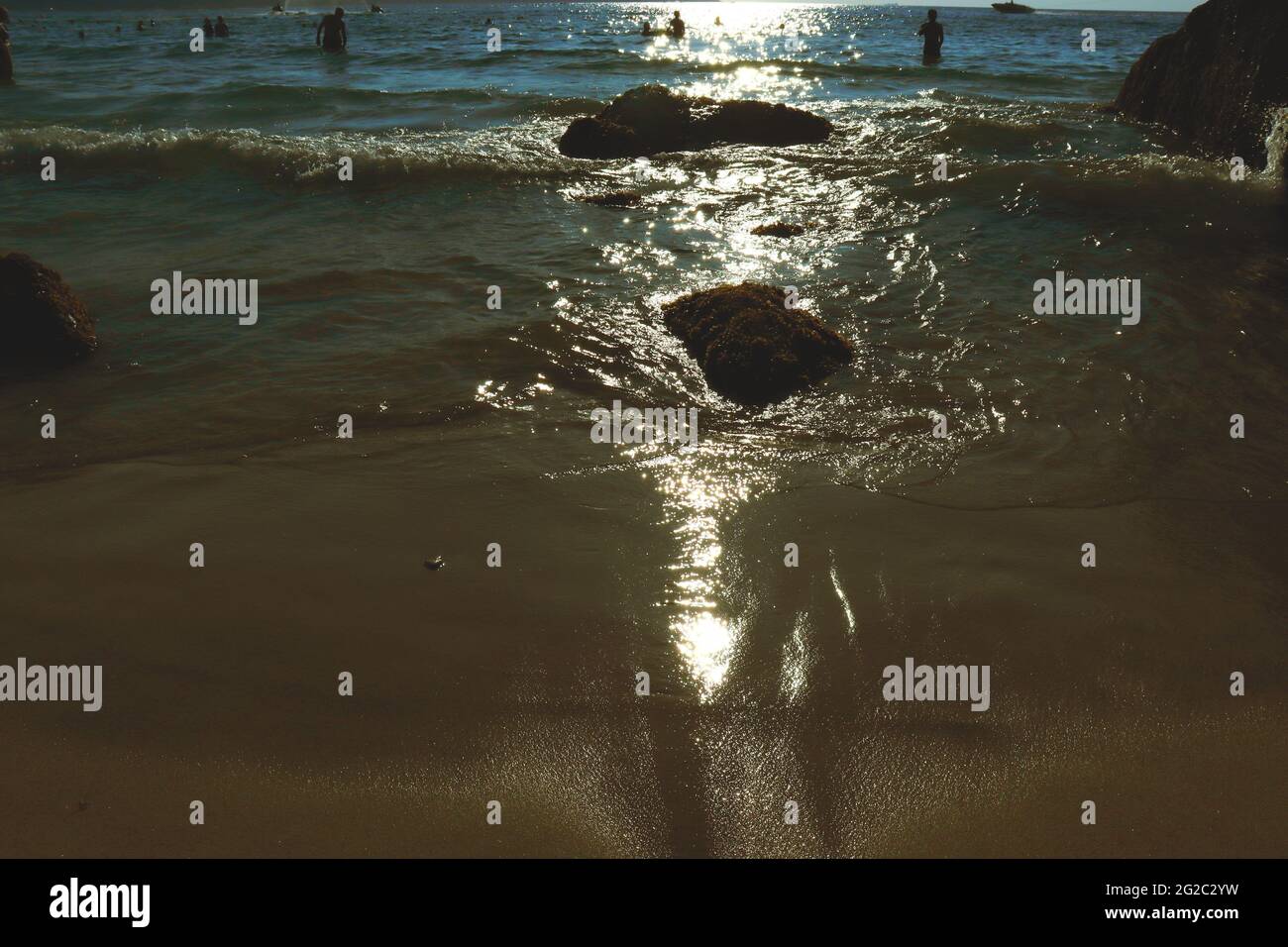 Heat at sea, waves glisten in the sun, beach vacation Stock Photo - Alamy