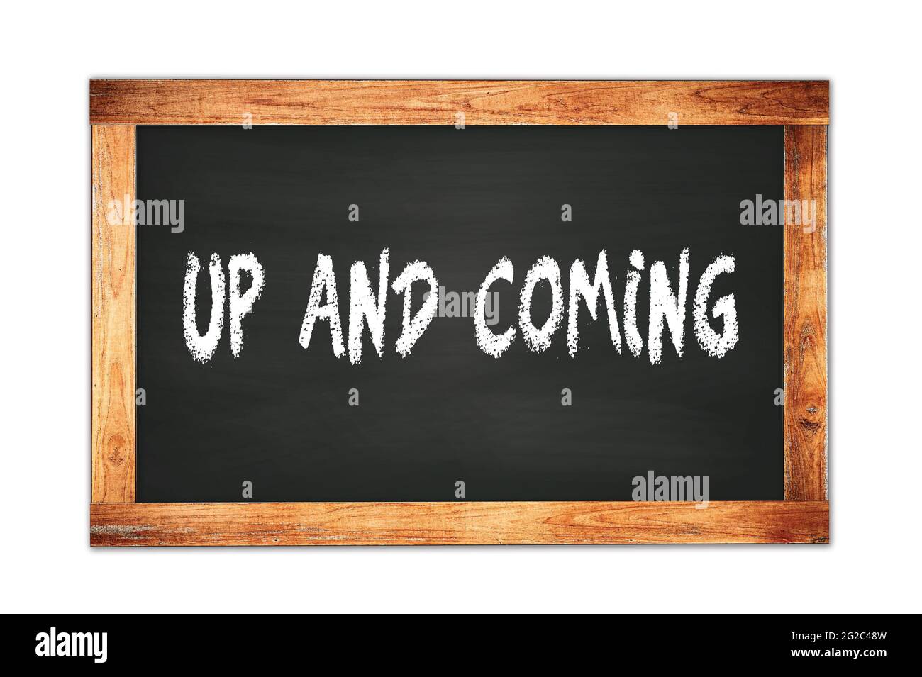 UP AND COMING text written on black wooden frame school blackboard ...