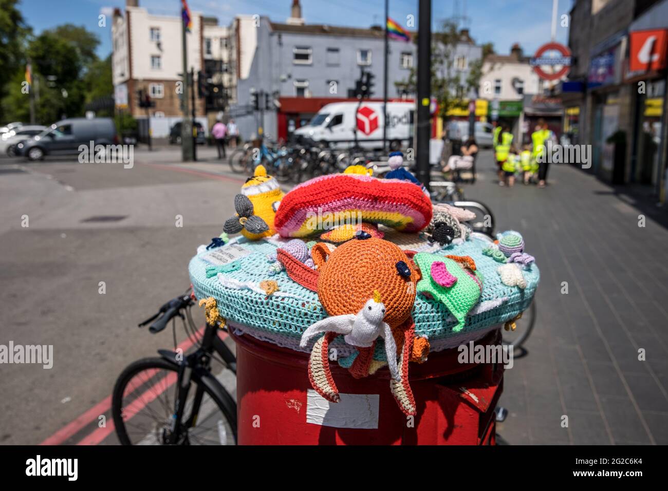 Yarn bombing on post boxes in Colliers Wood South London Stock Photo ...