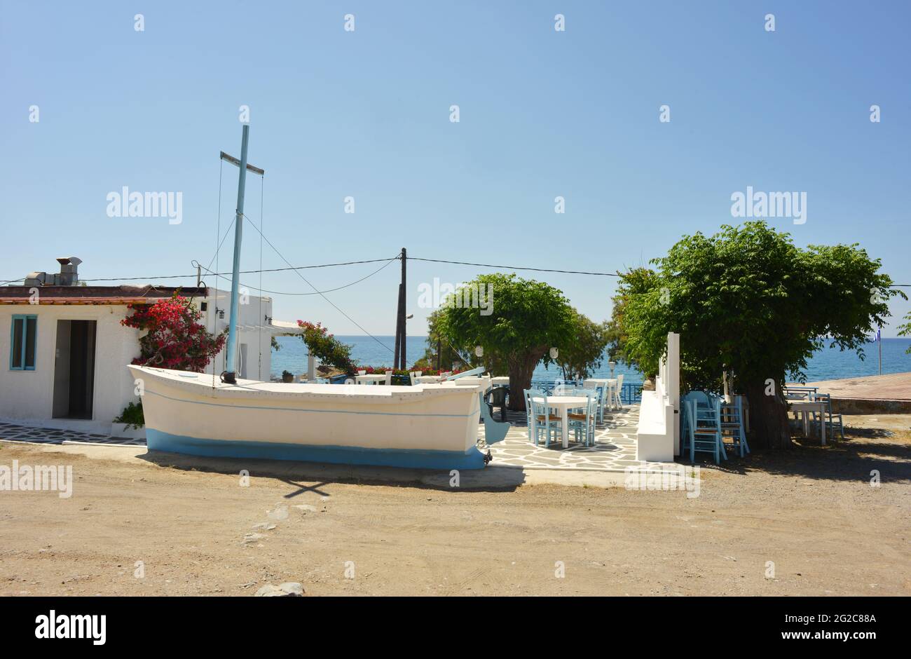 Rhodes Island, Kiotari small greek restaurant with sea view and a old ...