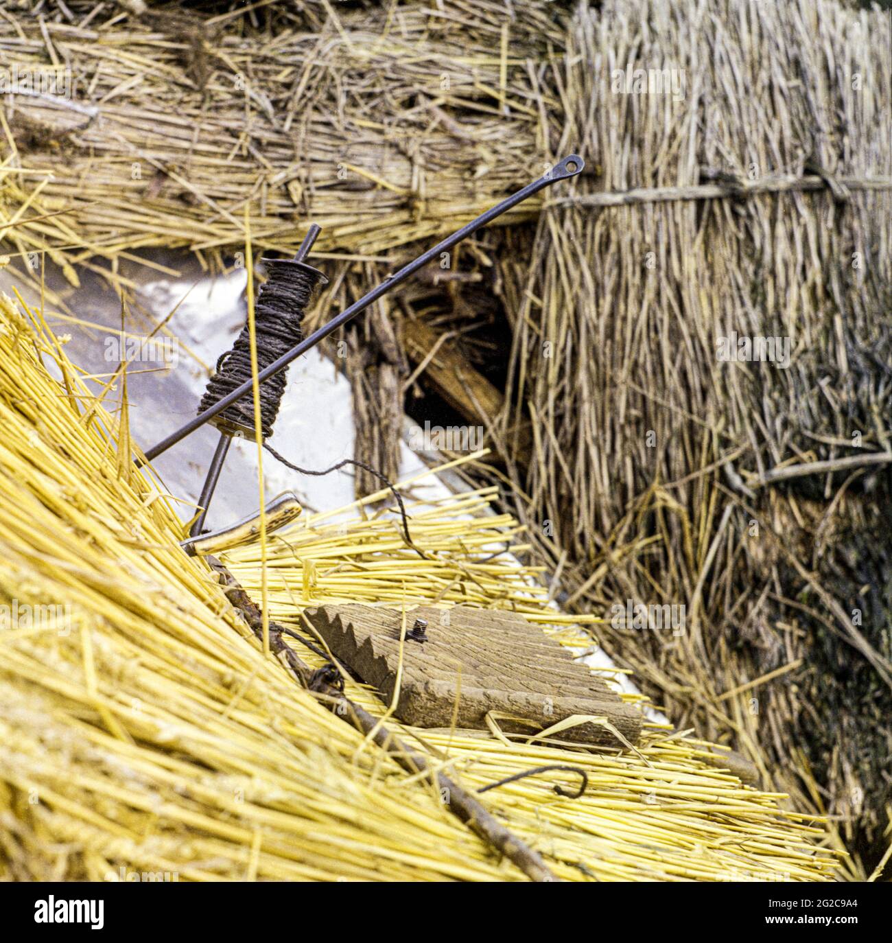 Thatching tools used by a thatcher thatching with traditional wheat ...