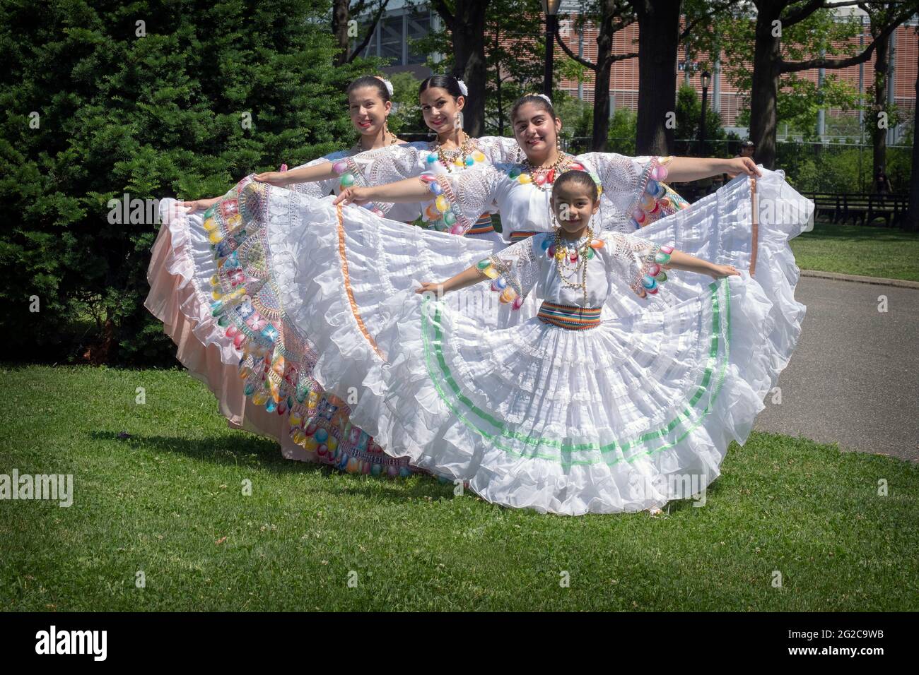 Posed photo of a group of Paraguayan American folk dancers in ethnic ...