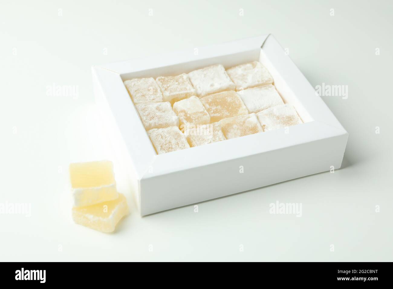 Delicious turkish delight cubes on white background Stock Photo - Alamy