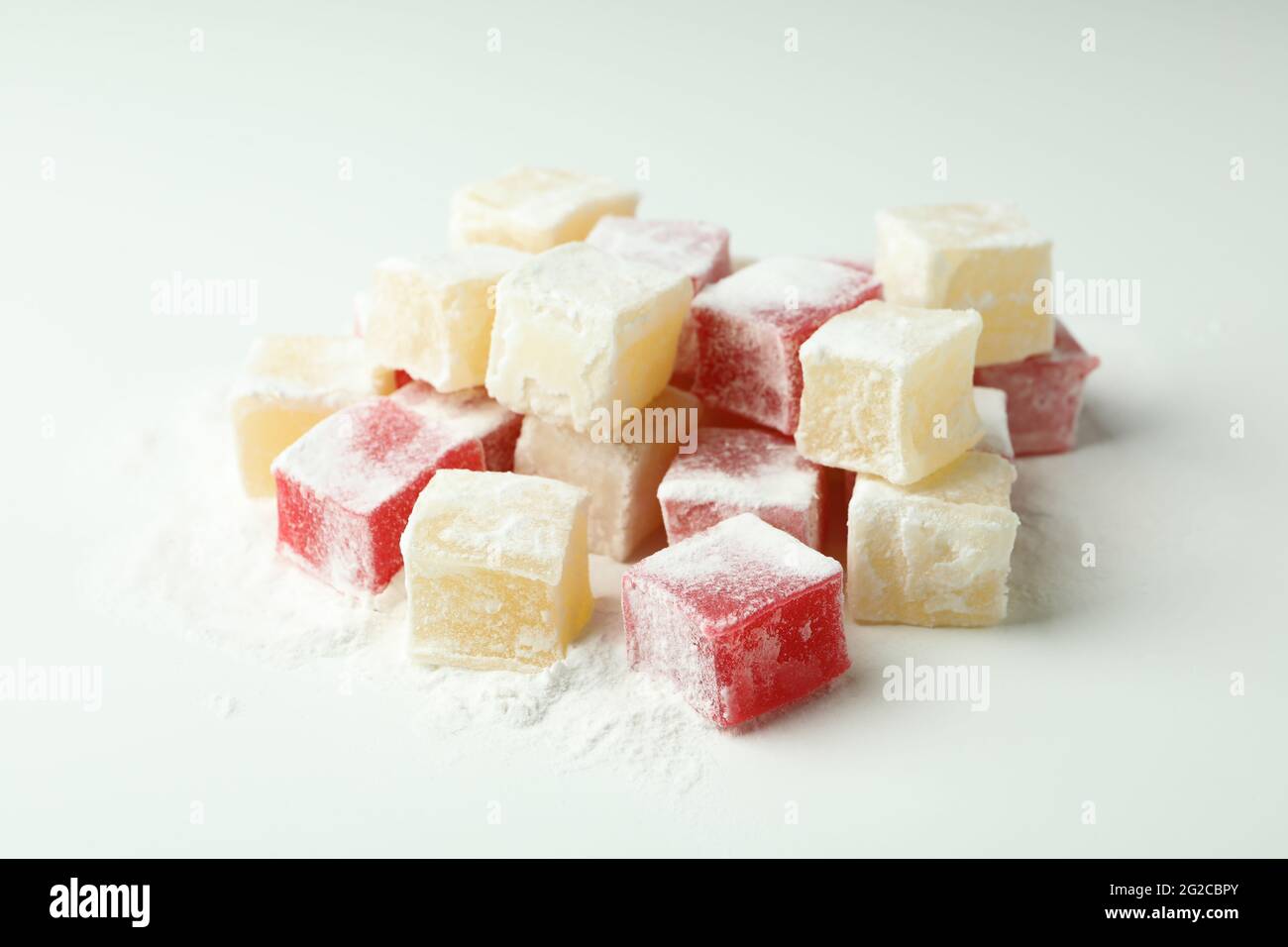 Delicious turkish delight cubes on white background Stock Photo - Alamy