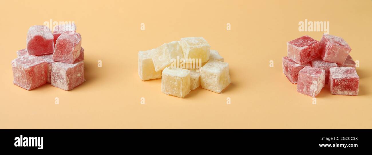 Delicious turkish delight cubes on beige background Stock Photo - Alamy