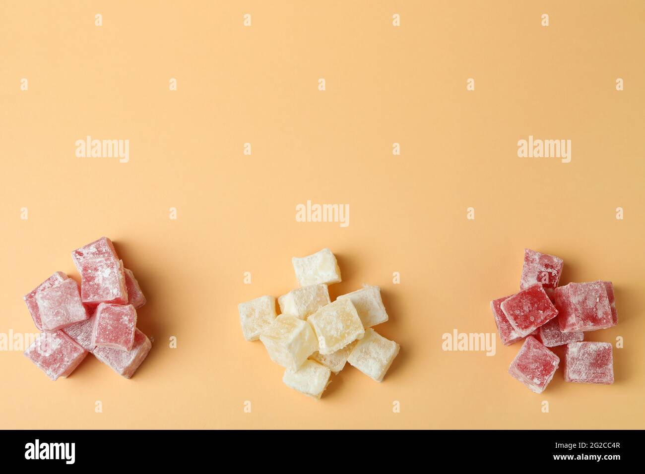 Delicious turkish delight cubes on beige background Stock Photo - Alamy