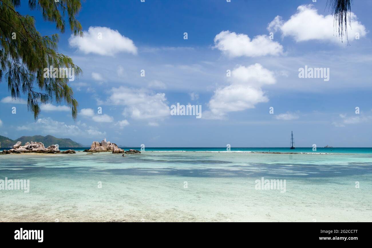 Turquoise blue lagoon at La Digue in the Seychelles islands Stock Photo ...