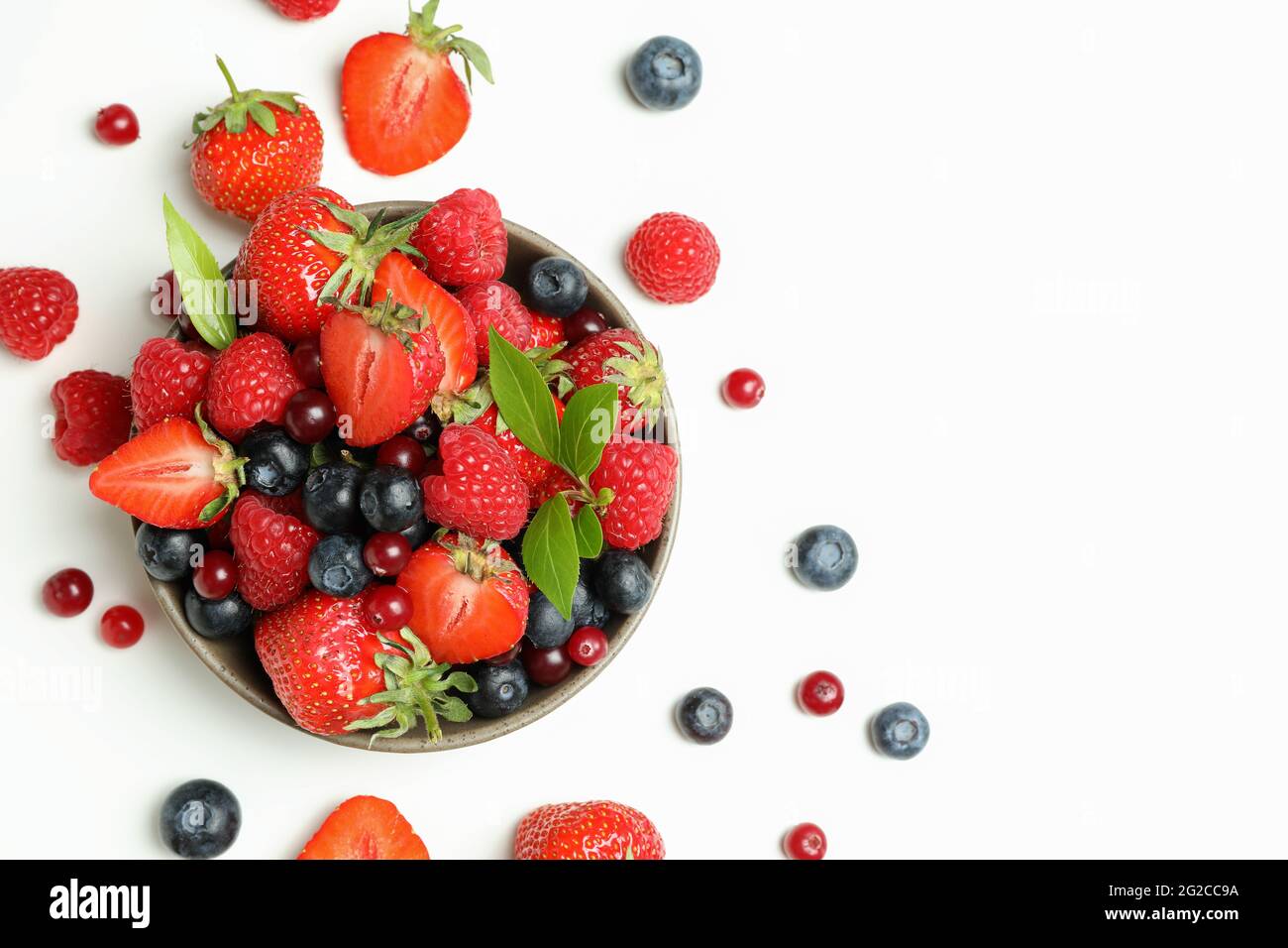 Delicious fresh berry mix on white background Stock Photo - Alamy