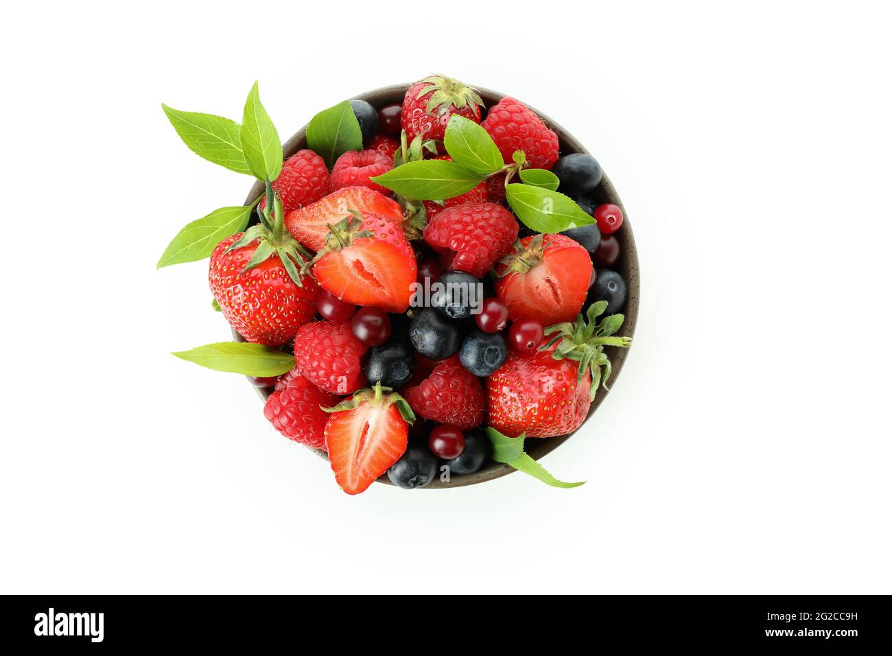 Delicious berry mix isolated on white background Stock Photo - Alamy