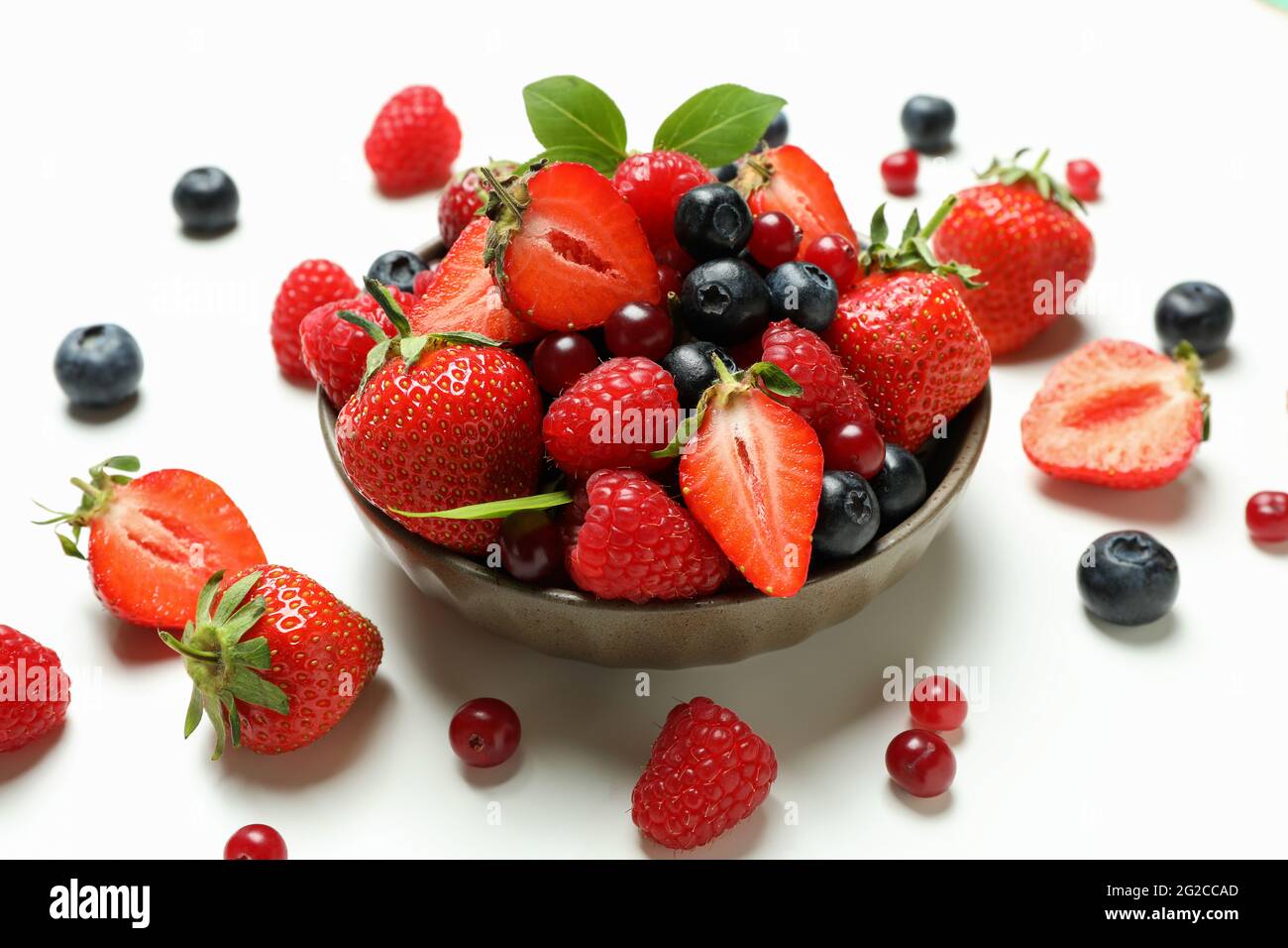 Delicious fresh berry mix on white background Stock Photo - Alamy