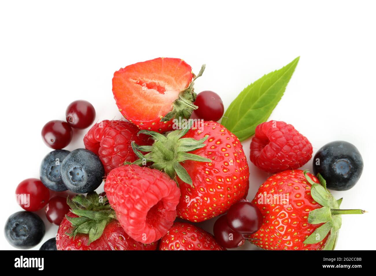 Delicious berry mix isolated on white background Stock Photo - Alamy