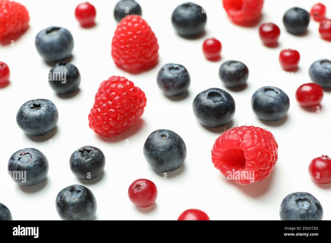 Delicious fresh berry mix on white background Stock Photo - Alamy