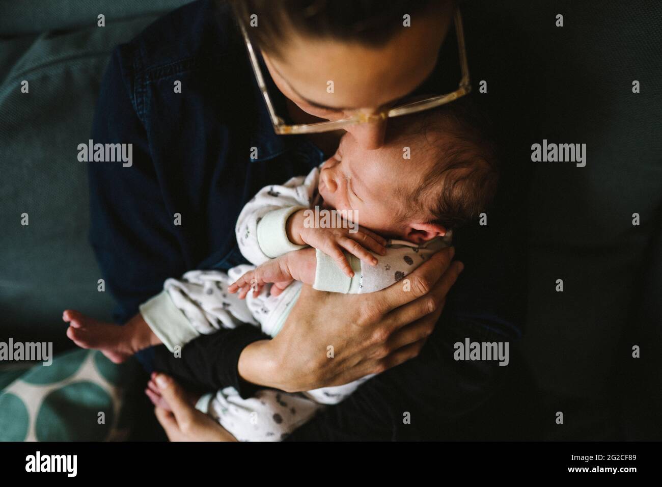 Mother holding newborn baby Stock Photo - Alamy Mother holding newborn baby Stock Photo - Alamy