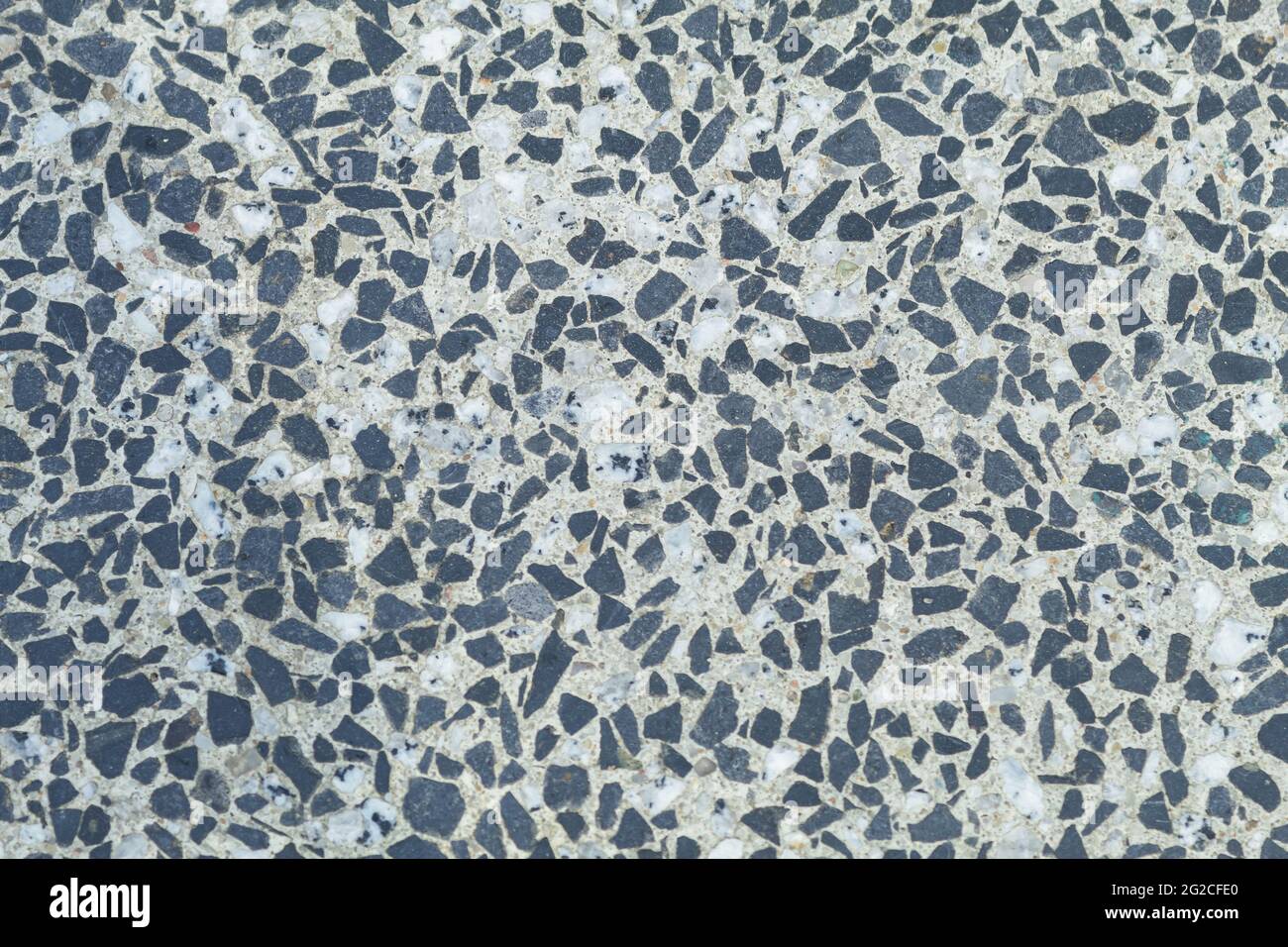 Texture of granite chips in concrete close-up. Colored granite floor ...