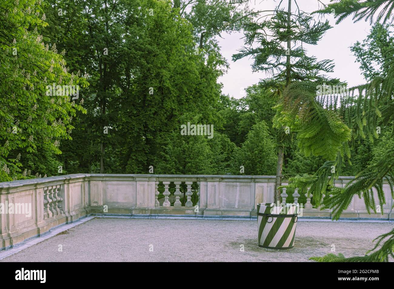 Vintage balcony of the old castle overlooking the garden. Terrace with ...
