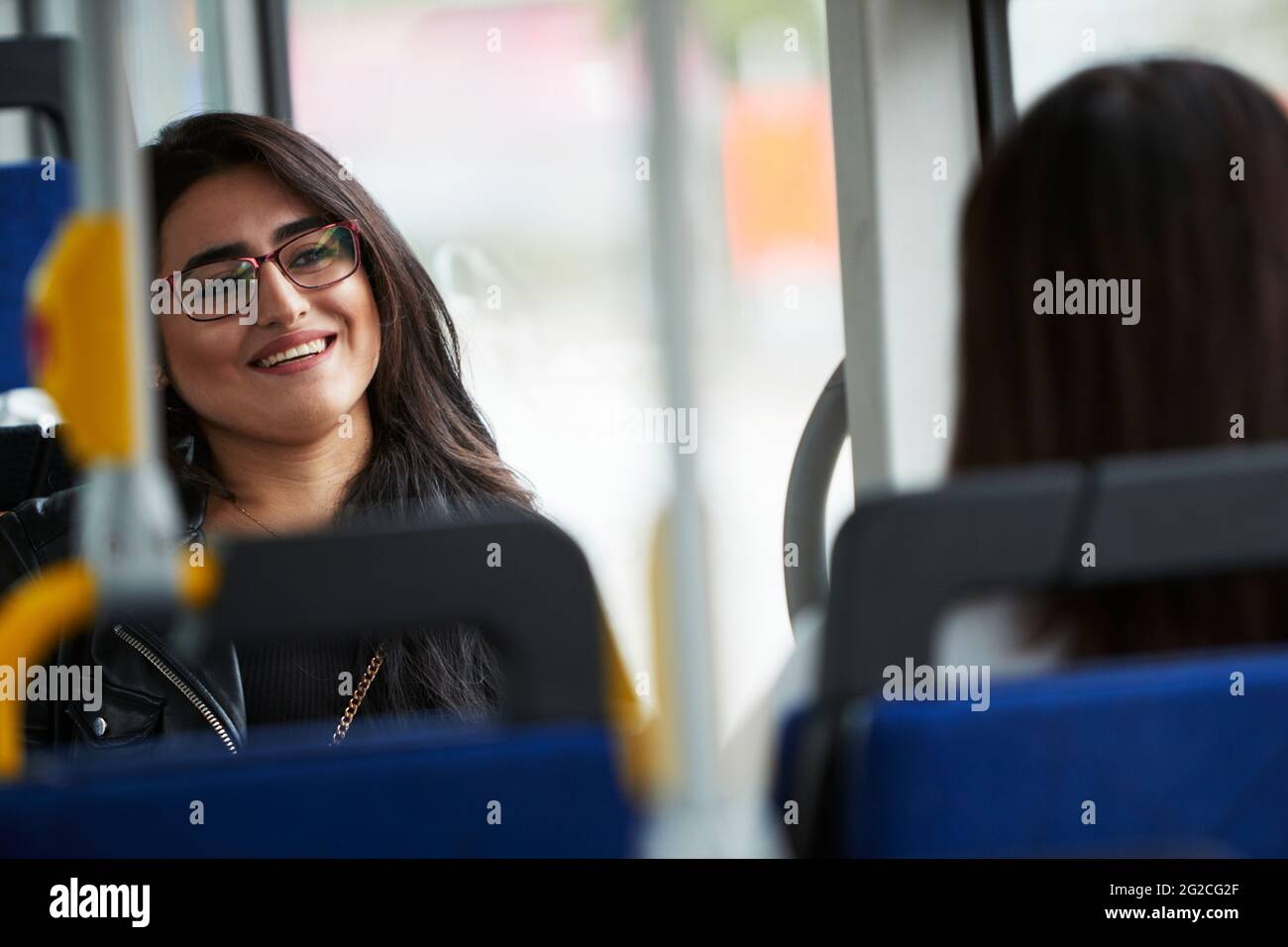 Young brunette woman sitting bus hi-res stock photography and images ...