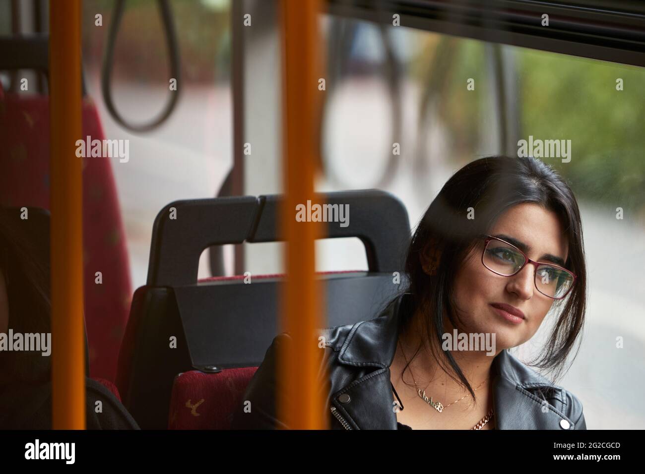 Young brunette woman sitting bus hi-res stock photography and images ...