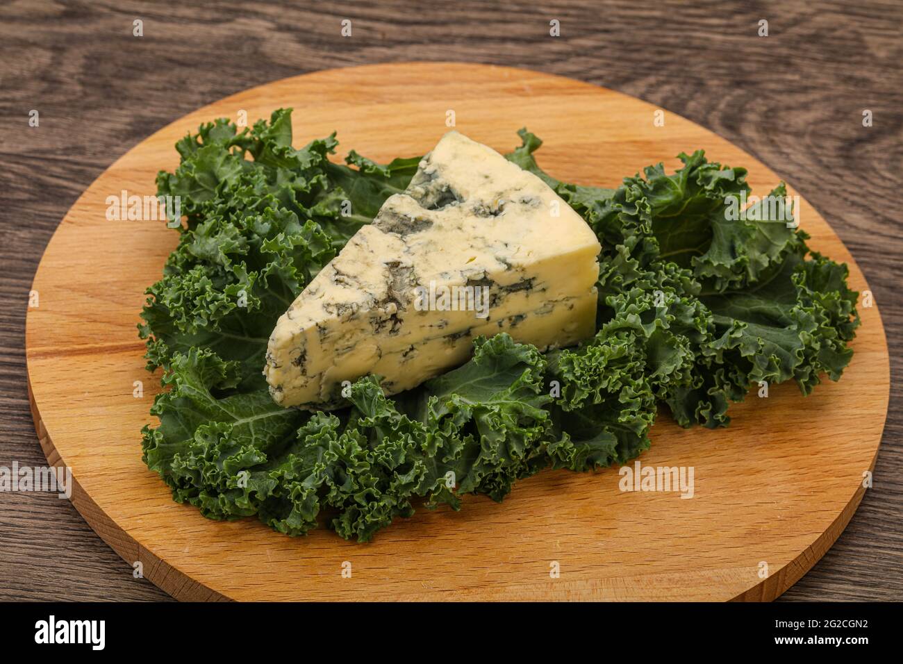 Dairy Blue cheese triangle with mold Stock Photo - Alamy
